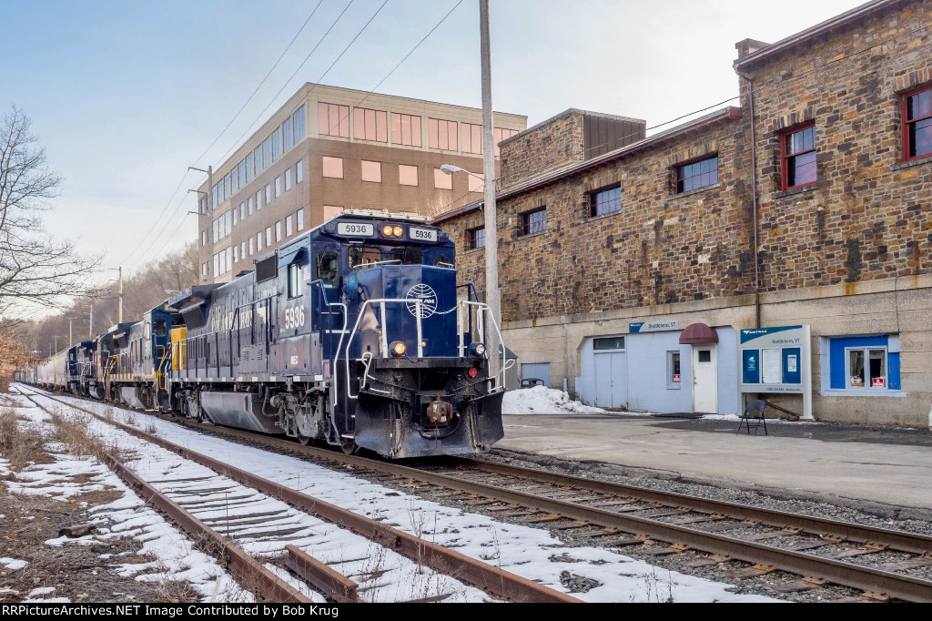 MEC 5936 rolling northbound past the Brattleboro, VT Amtrak Station